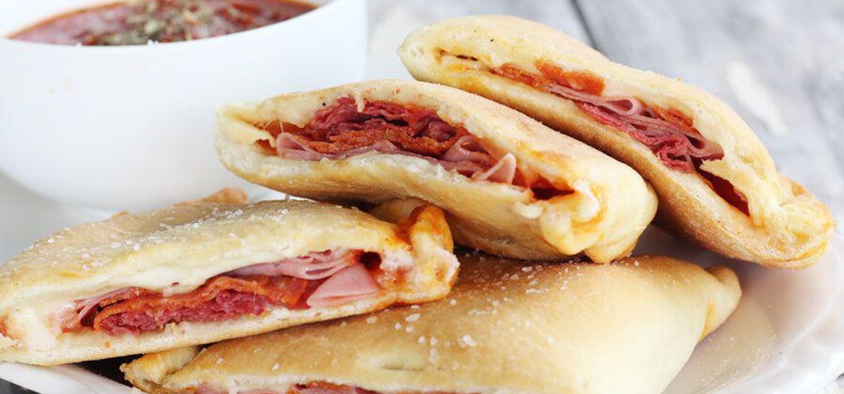 Meat and Cheese Pizza Calzones Recipe | SideChef