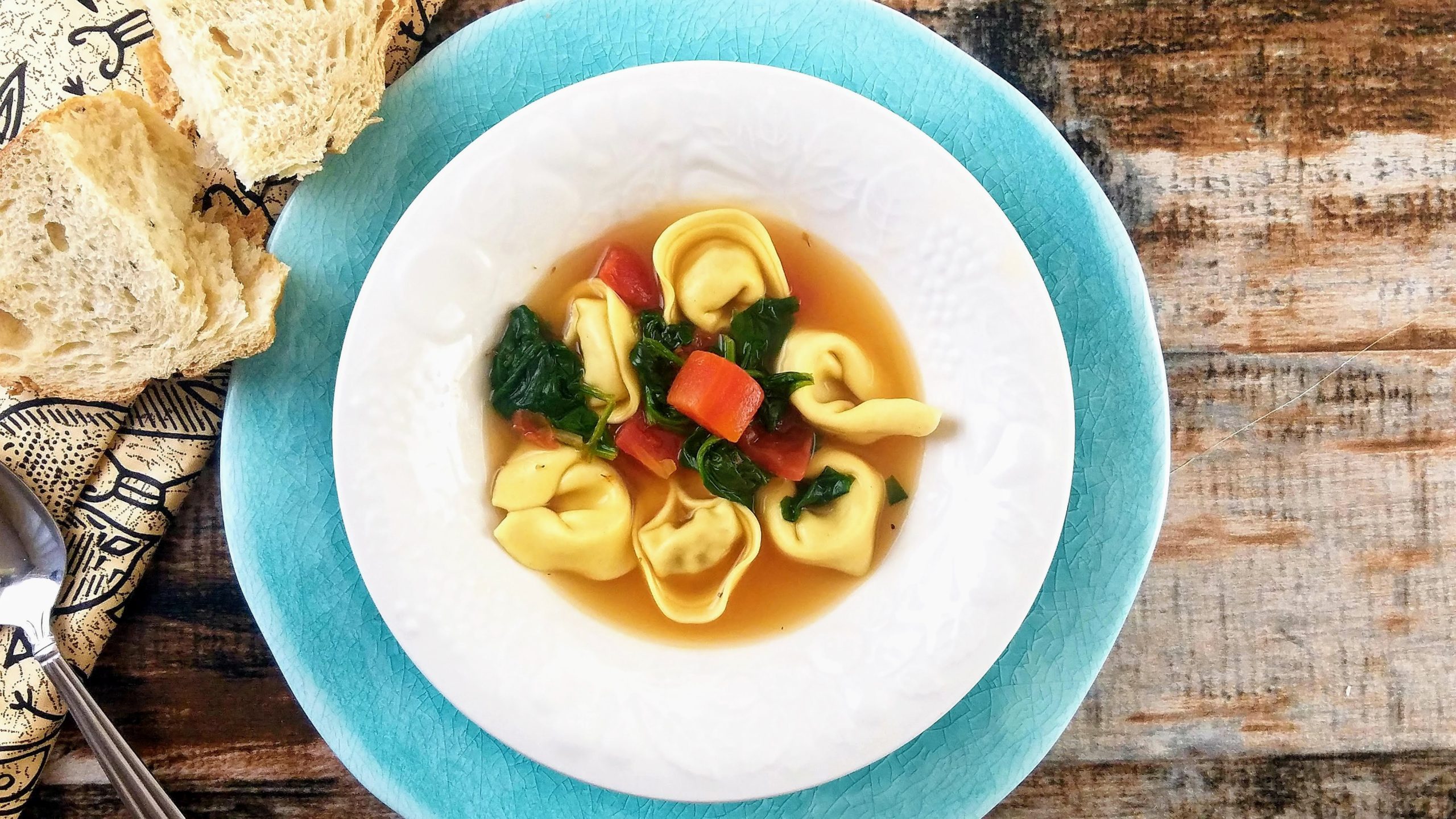 Tortellini En Brodo with Spinach and Tomatoes Recipe | SideChef
