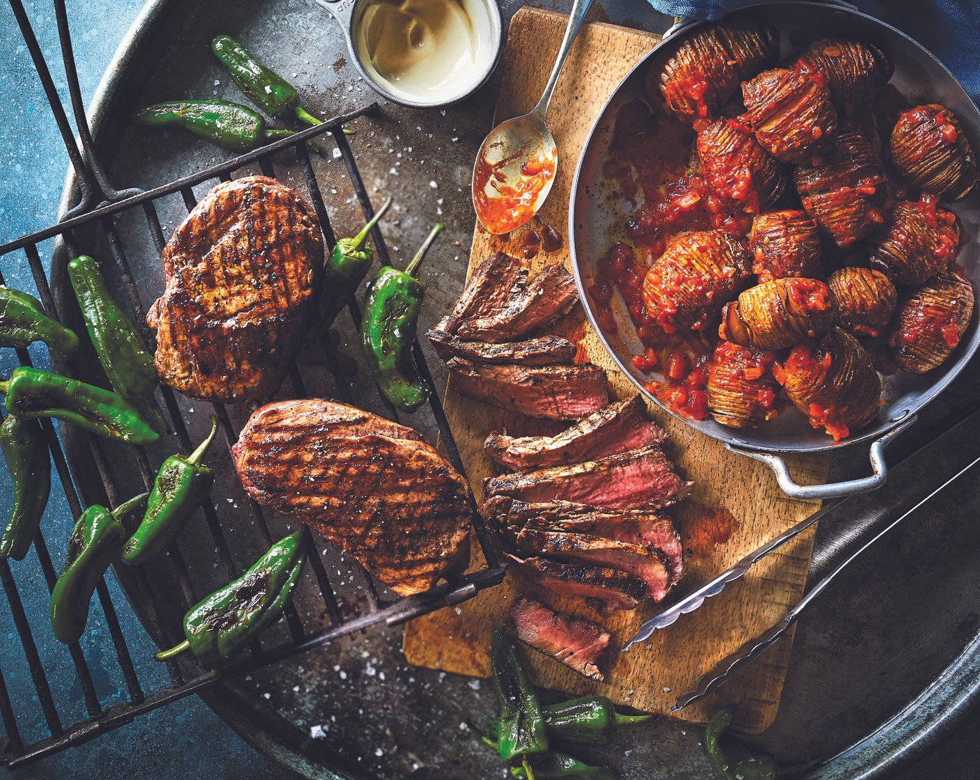 Sizzling Spanish beef fillets with hasselback patatas bravas | M&S