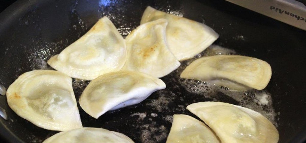 Pierogi with Feta, Tomato, and White Wine Sauce Recipe | SideChef